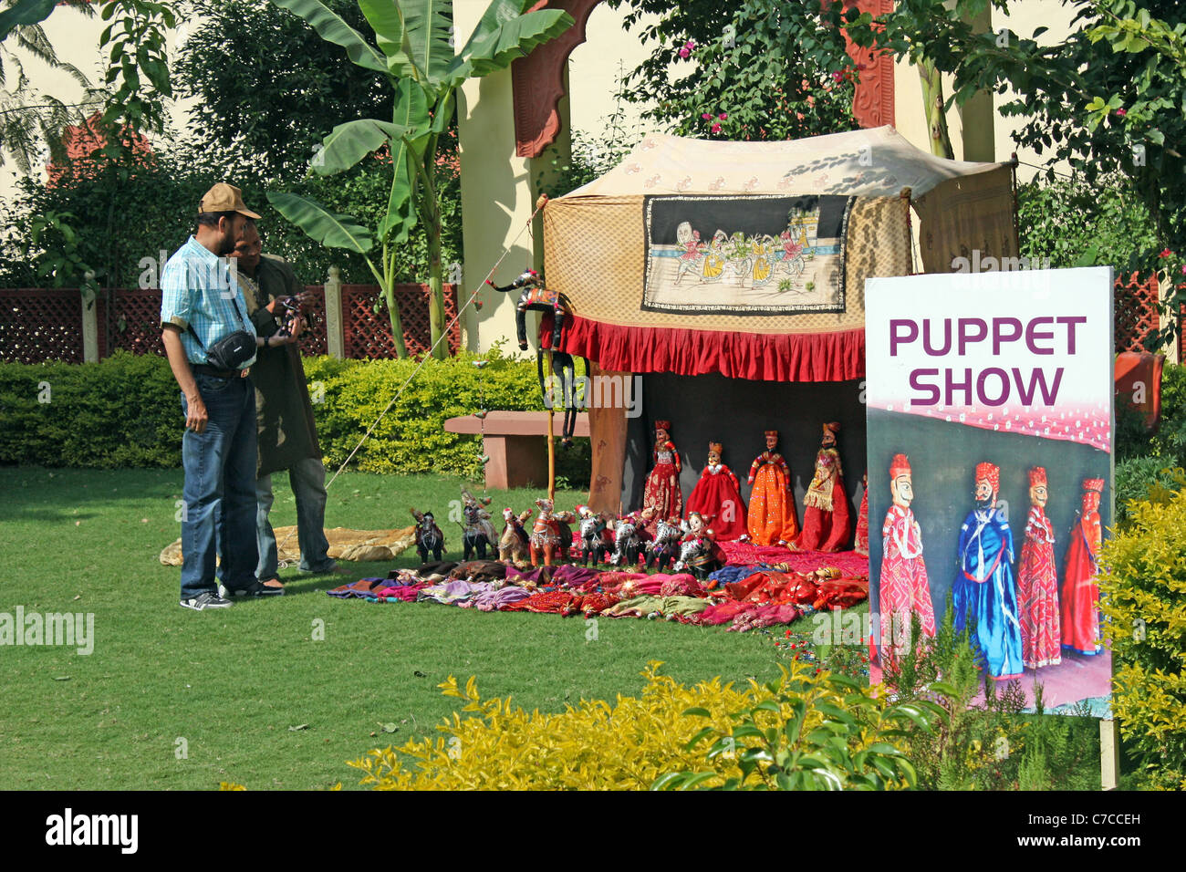 People taking pictures of handicraft puppets in a Puppet show Stock ...