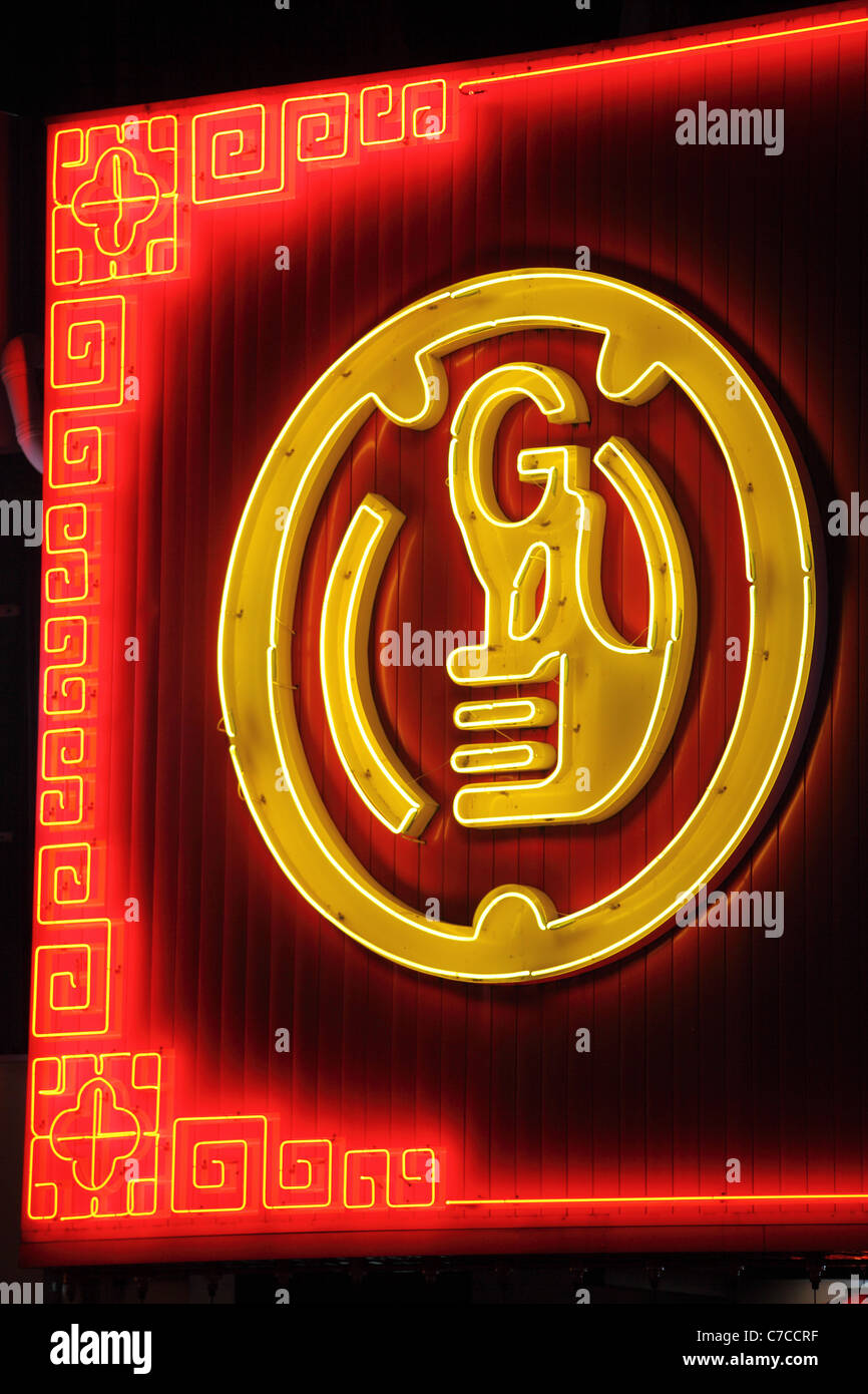 Bright neon sign in front of restaurant Stock Photo - Alamy