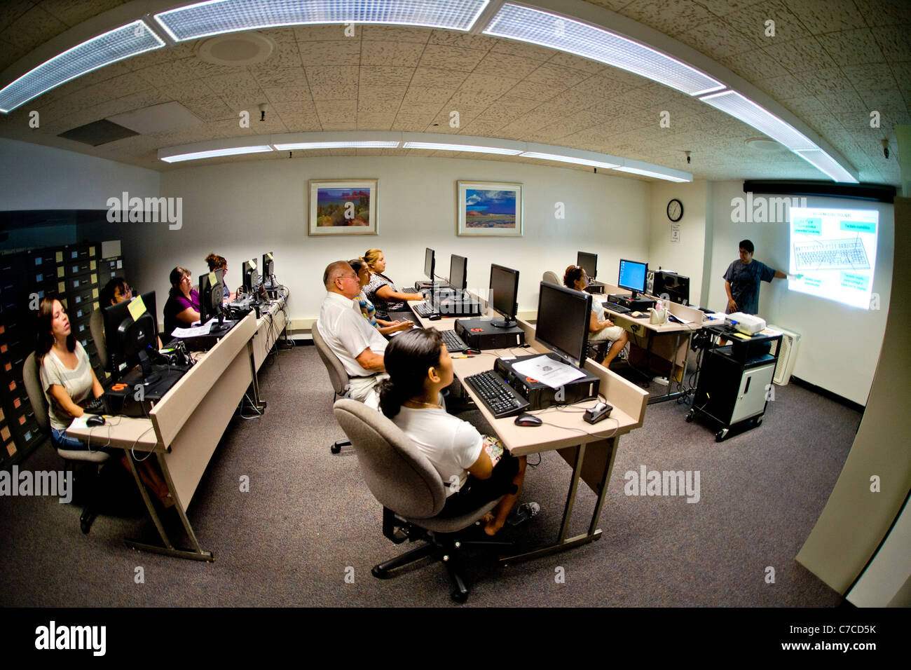 Seniors learning computer skills hi-res stock photography and images ...