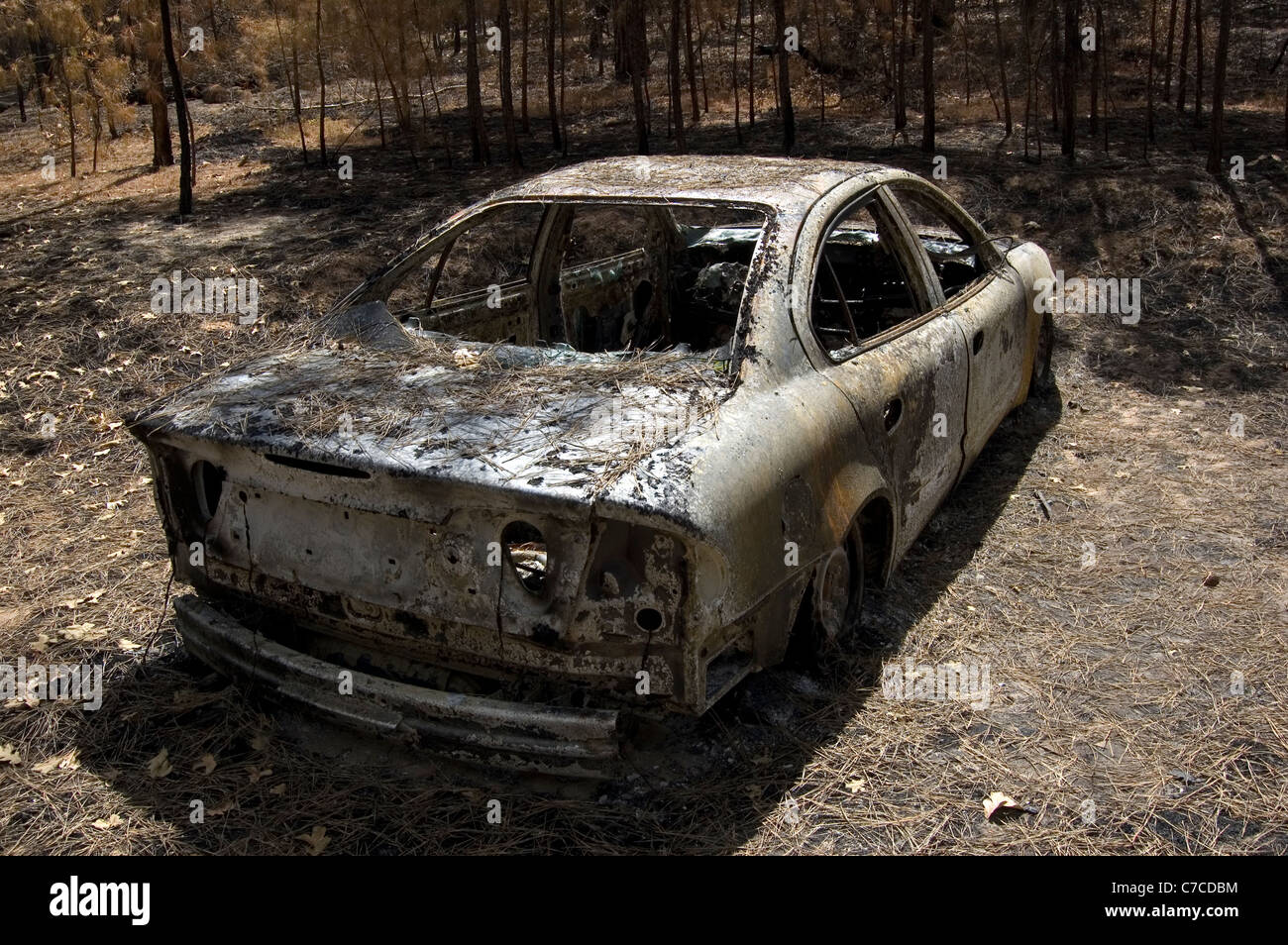 A burnt car after a house fire Stock Photo - Alamy