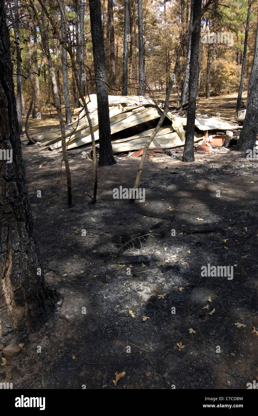 A burnt home or building after a forest fire Stock Photo - Alamy