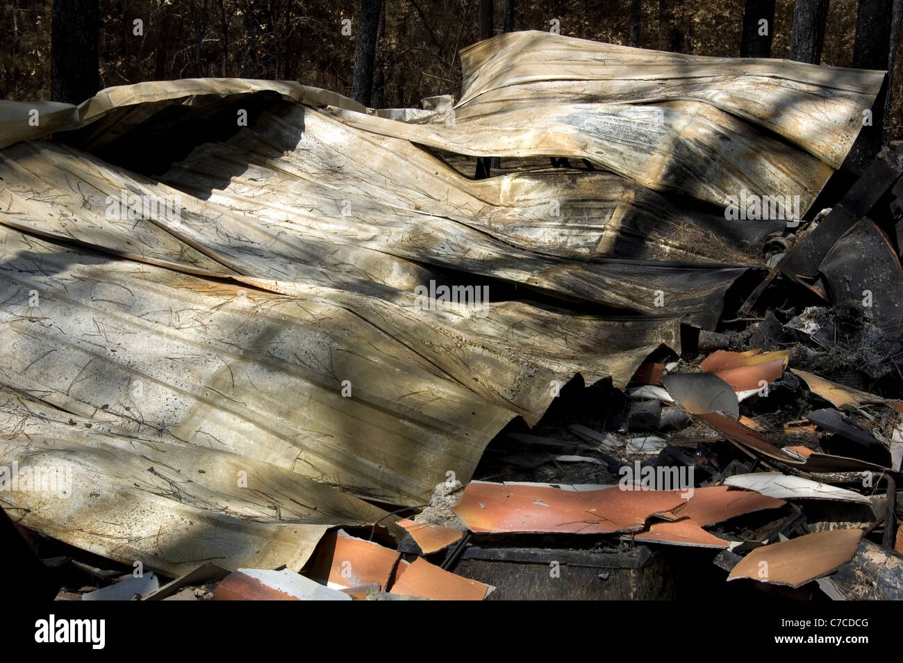 A burnt building after a forest fire Stock Photo - Alamy