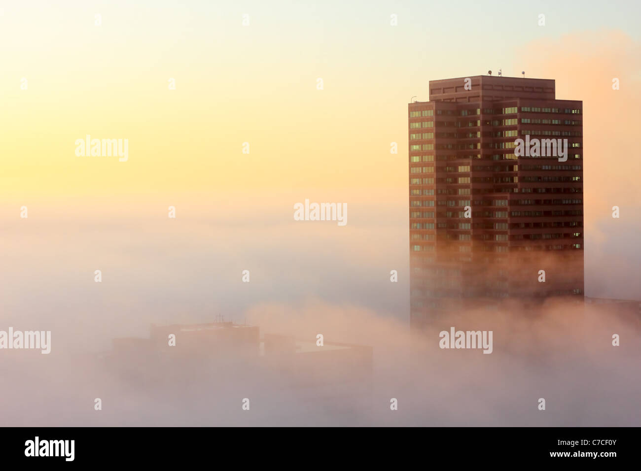 Denver, CO - Fog creeps through Denver during the early morning rush ...