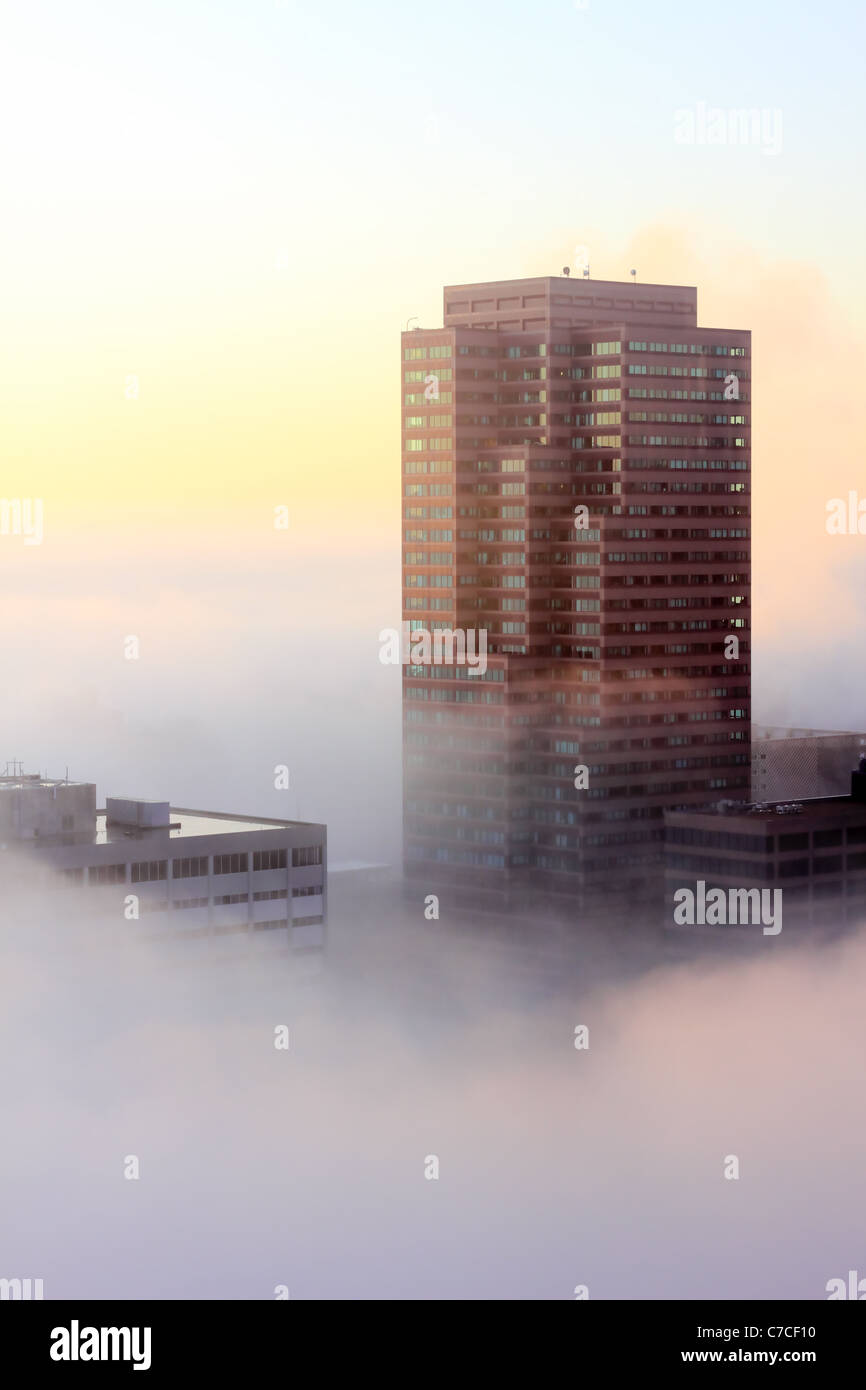 Denver, CO - Fog creeps through Denver during the early morning rush ...