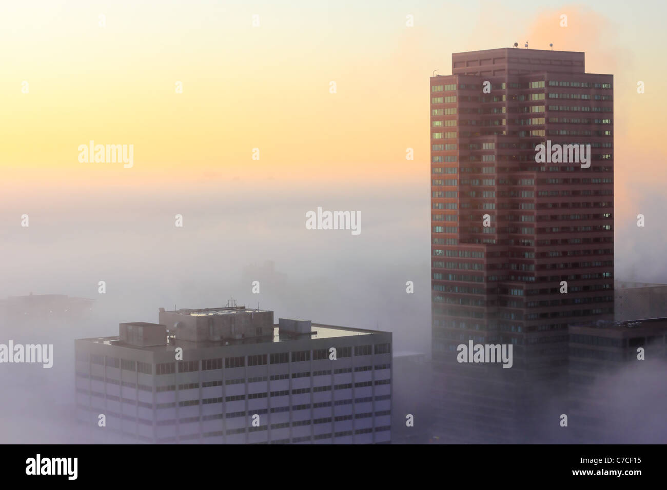 Denver, CO - Fog creeps through Denver during the early morning rush ...