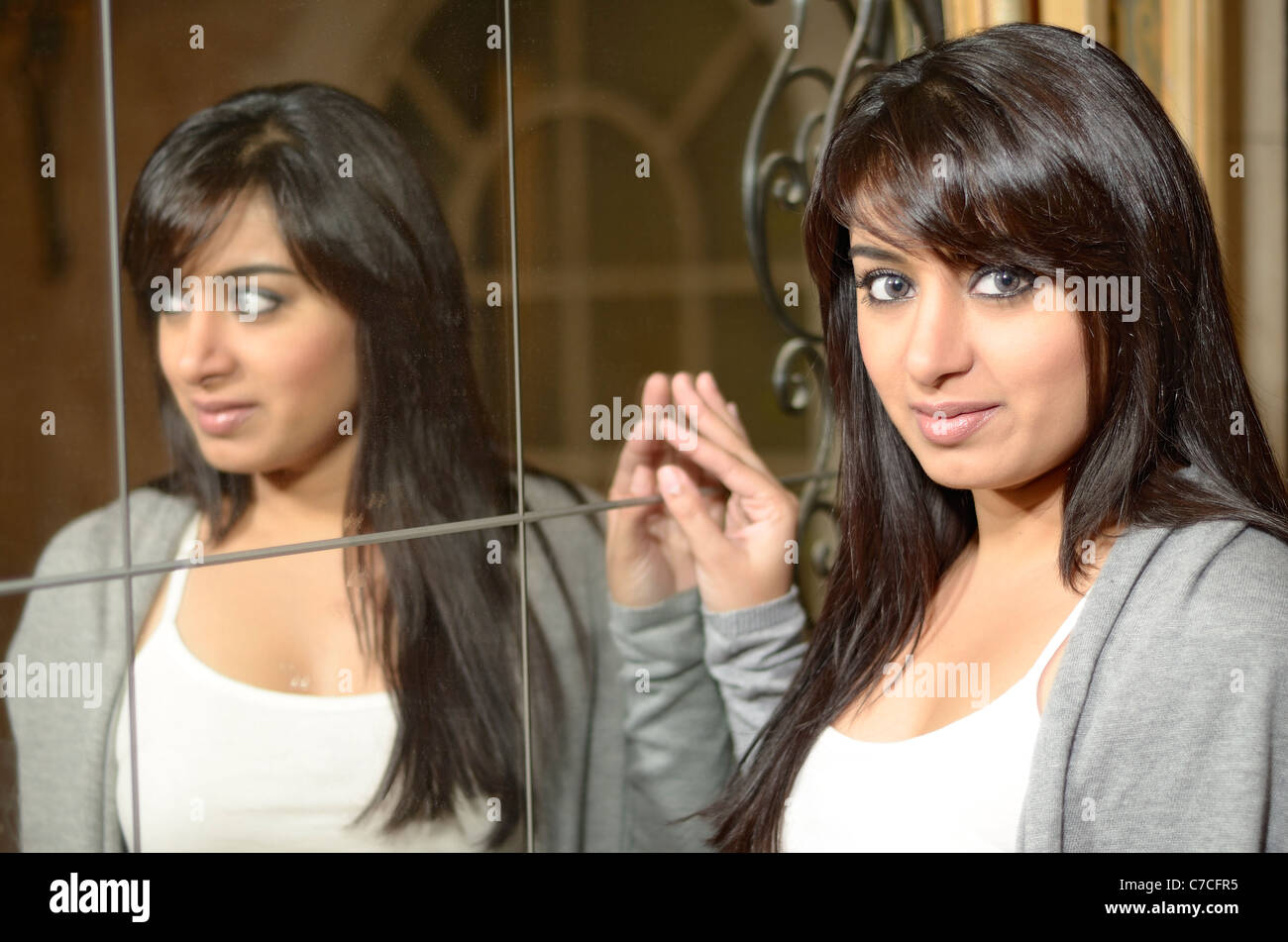 Young Asian woman with reflection Stock Photo - Alamy