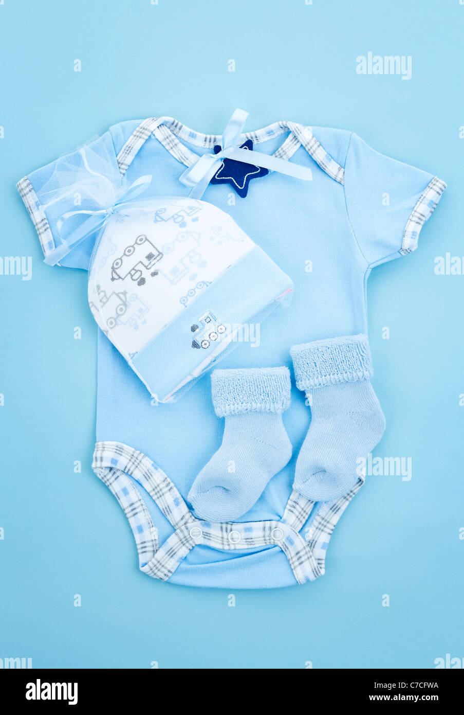 Blue infant boy clothing for baby shower Stock Photo - Alamy