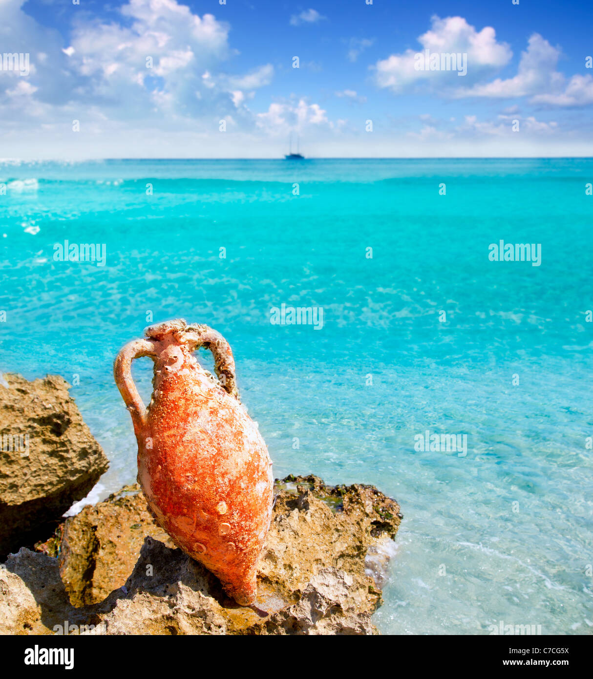 Amphora from roman culture on mediterranean turquoise beach in Spain ...