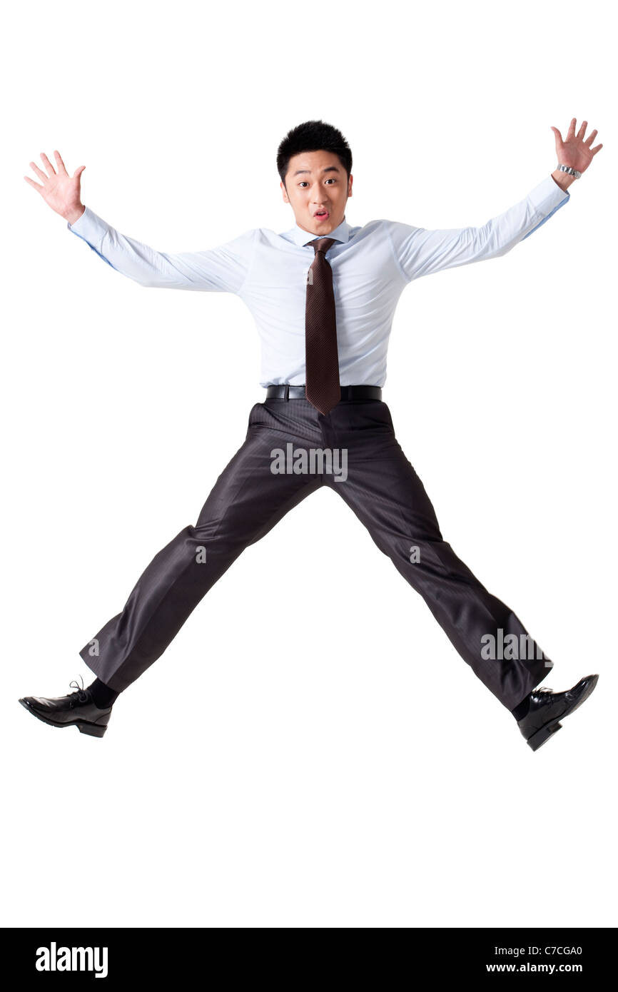 Portrait of a Businessman Jumping Up Stock Photo - Alamy