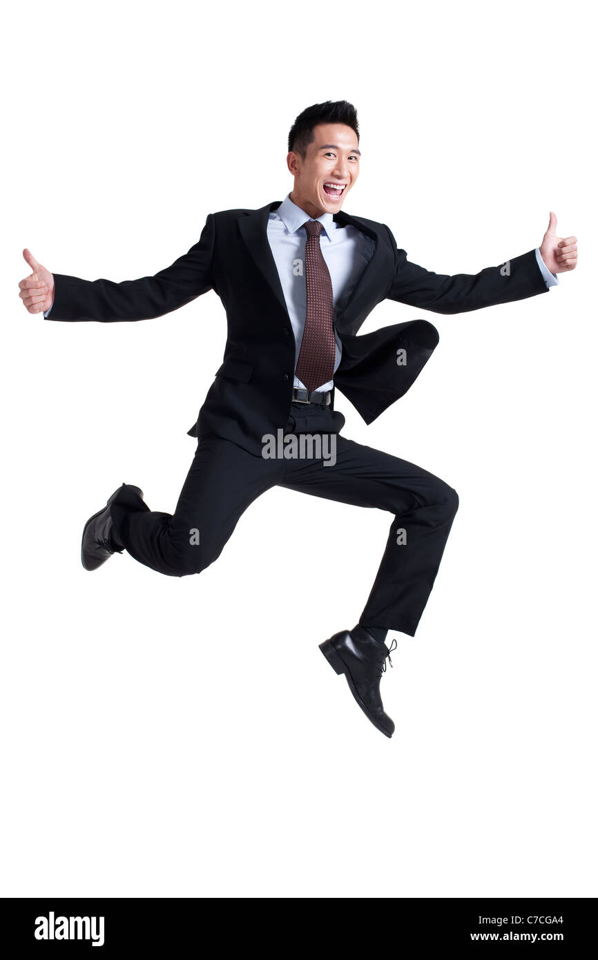 Portrait of an Excited Businessman Jumping Up Stock Photo - Alamy