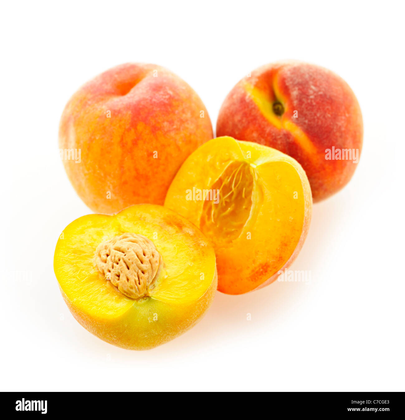 Few ripe peaches isolated on white background Stock Photo - Alamy