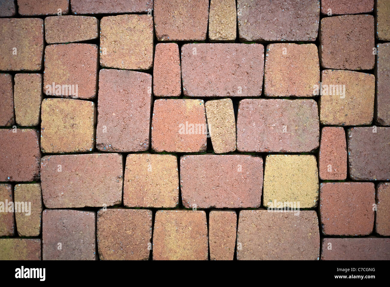 Background from paving stones, rectangular stones in red shades of ...