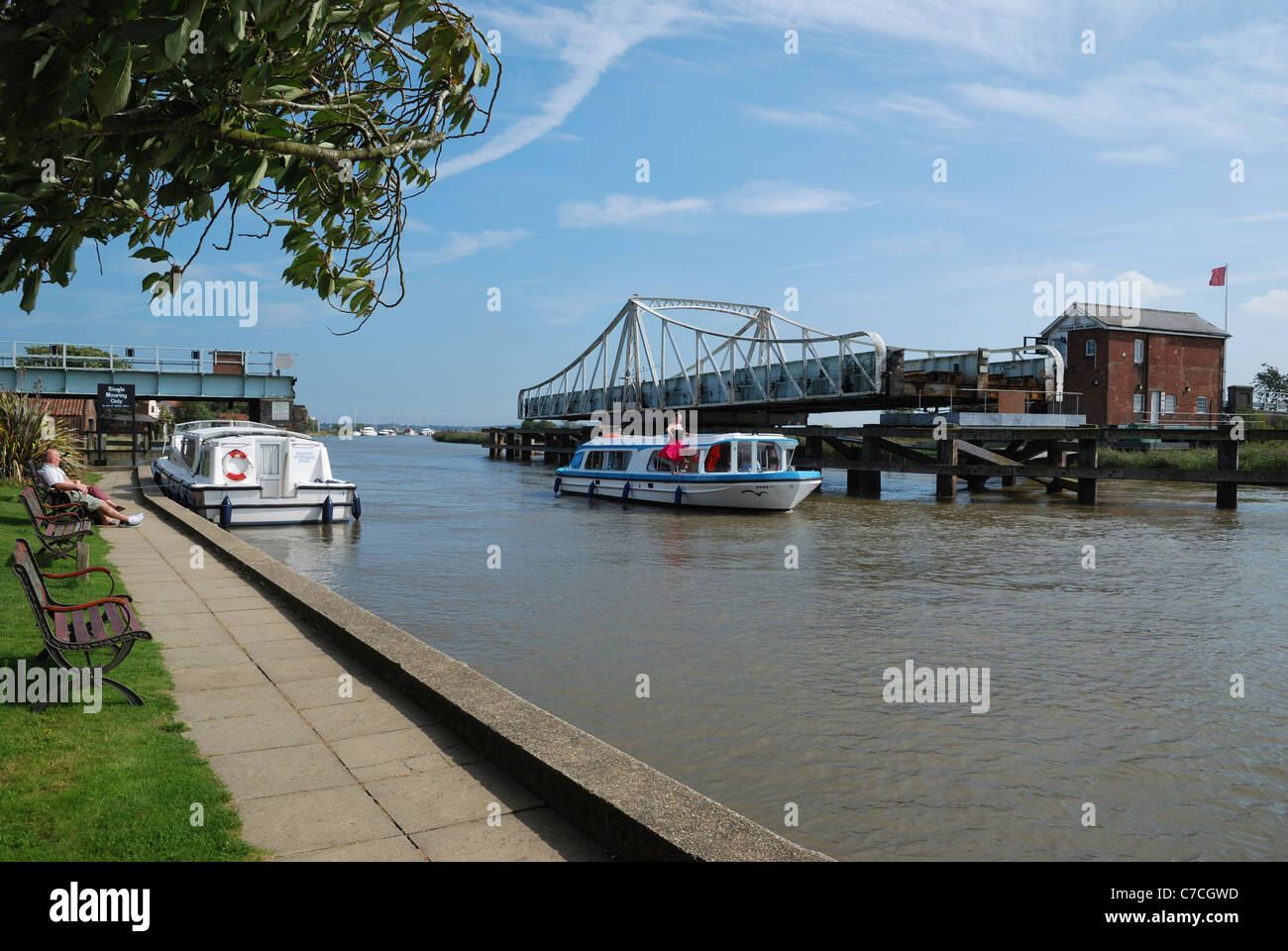 A pleasure cruiser passing the swing bridge at Reedham, Norfolk ...