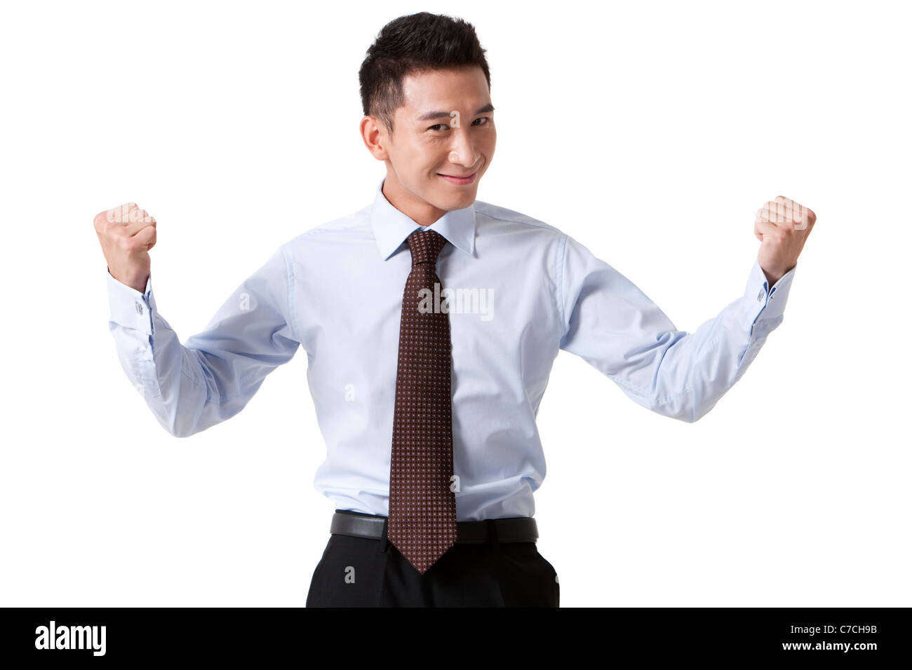 Portrait of a Businessman Flexing Stock Photo - Alamy