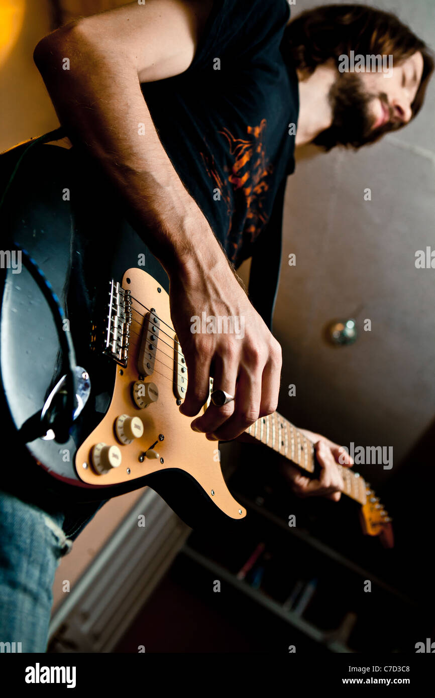 Man playing electric guitar Stock Photo - Alamy