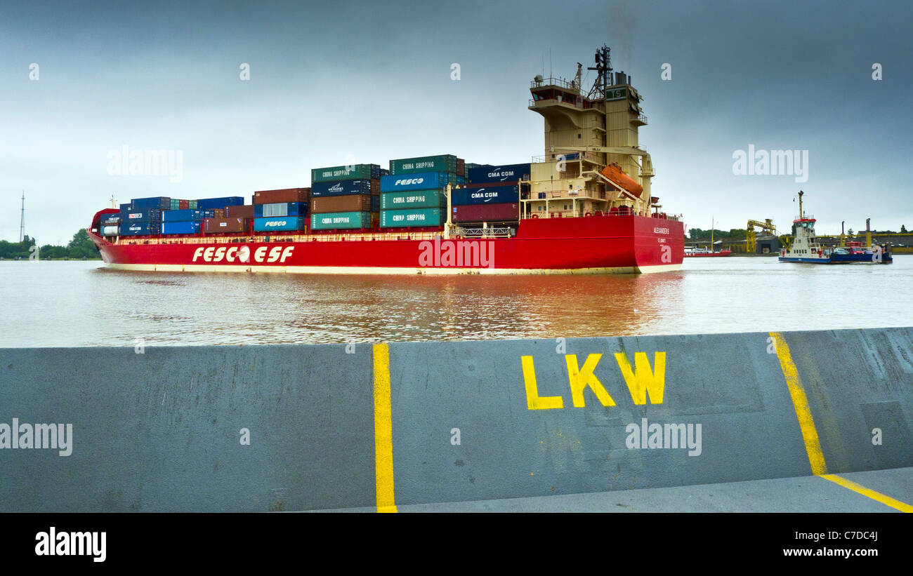 Container ship on the river Elbe at Brunsbuttel, Germany Stock Photo ...