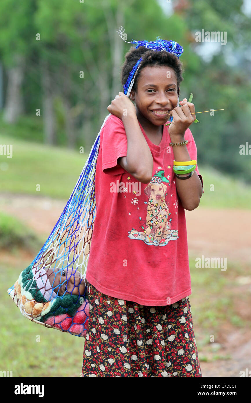 Baby in traditional woven bag hi-res stock photography and images - Alamy