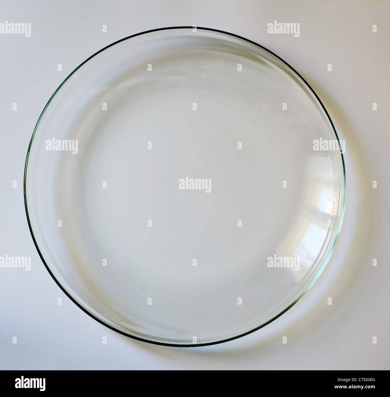 empty clear glass plate isolated in white Stock Photo - Alamy