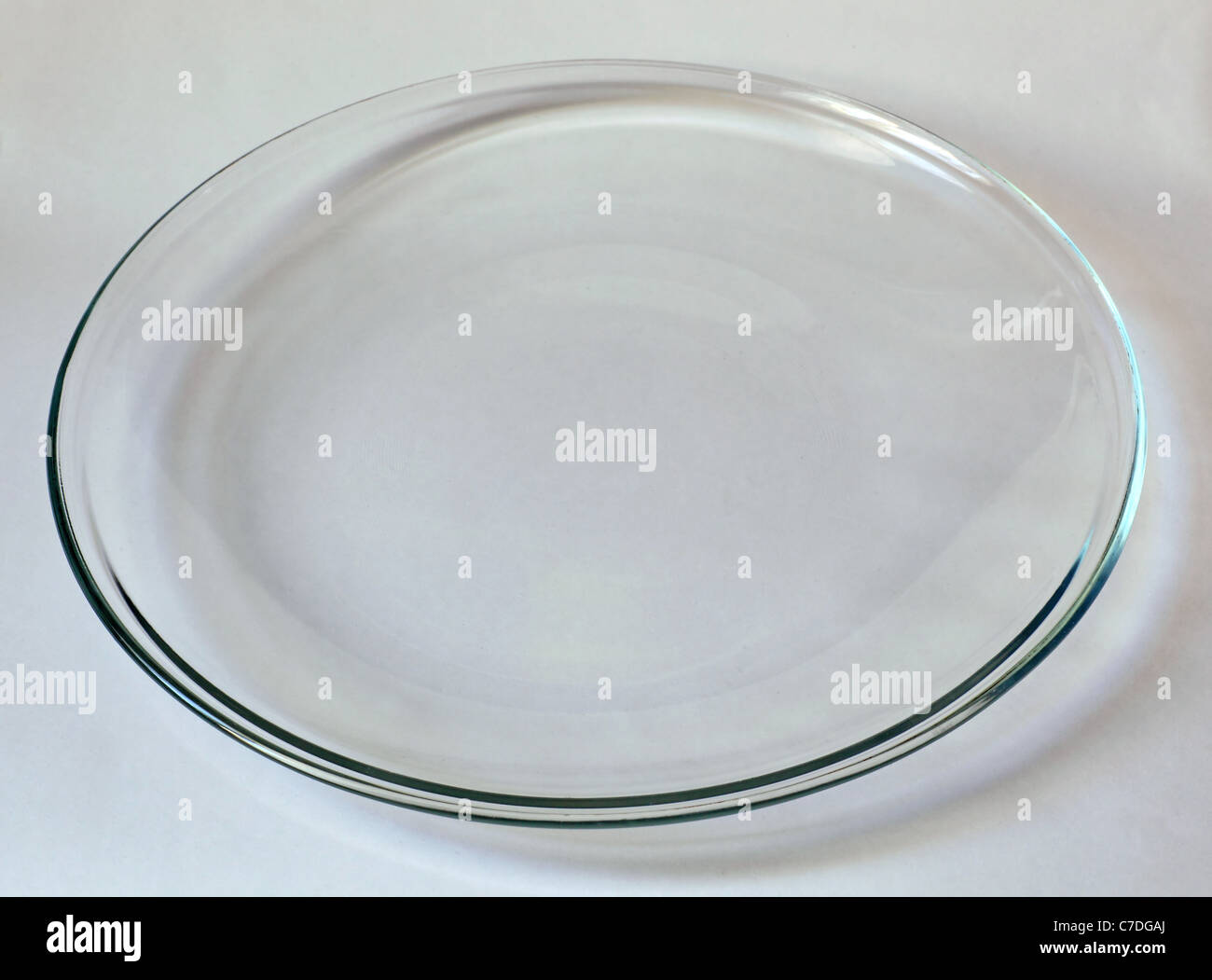 empty new glass plate isolated in white Stock Photo - Alamy