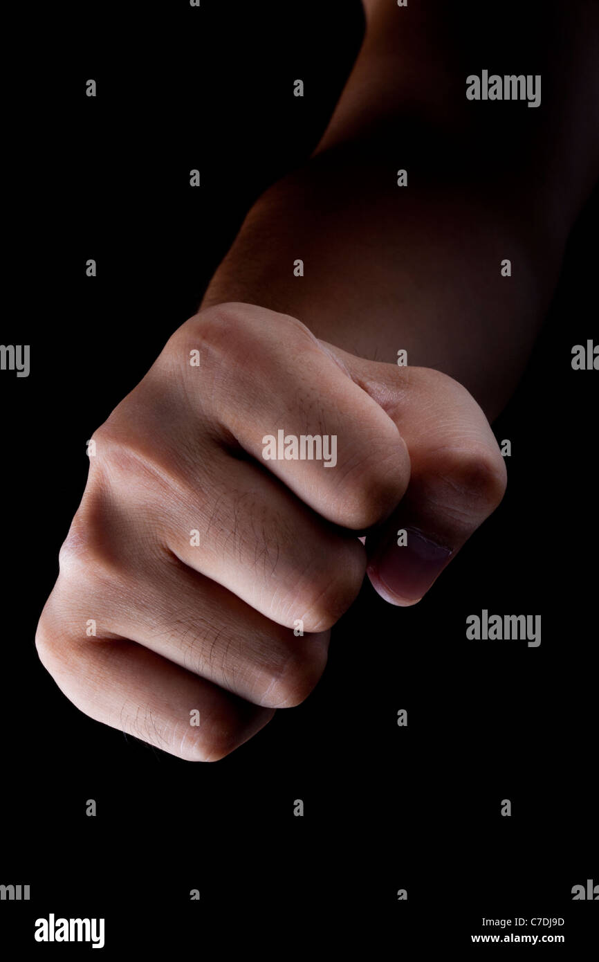 Man's Hands Clenched Making a Fist Stock Photo - Alamy