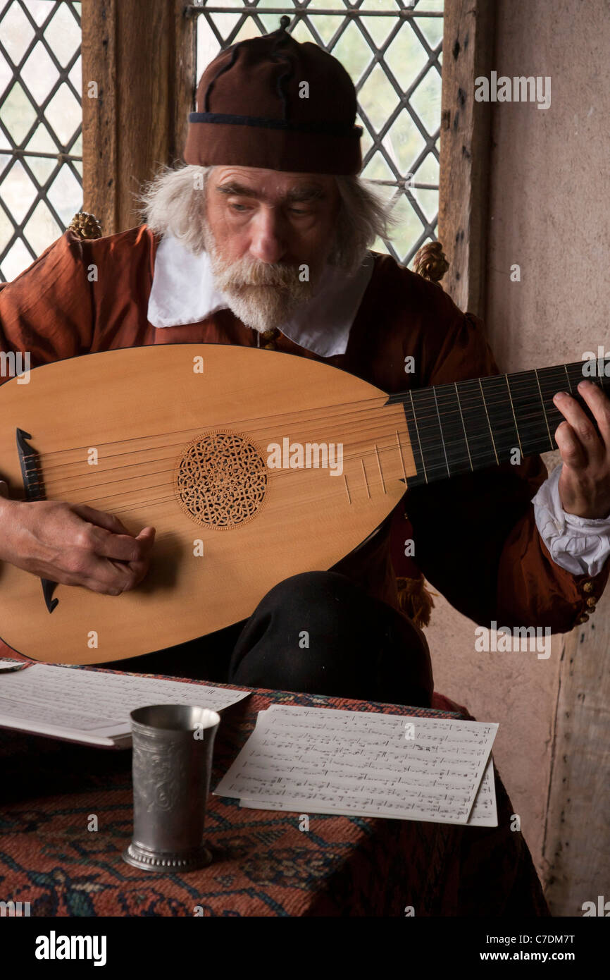 Public demonstration and historical re-enactment of a musician playing ...