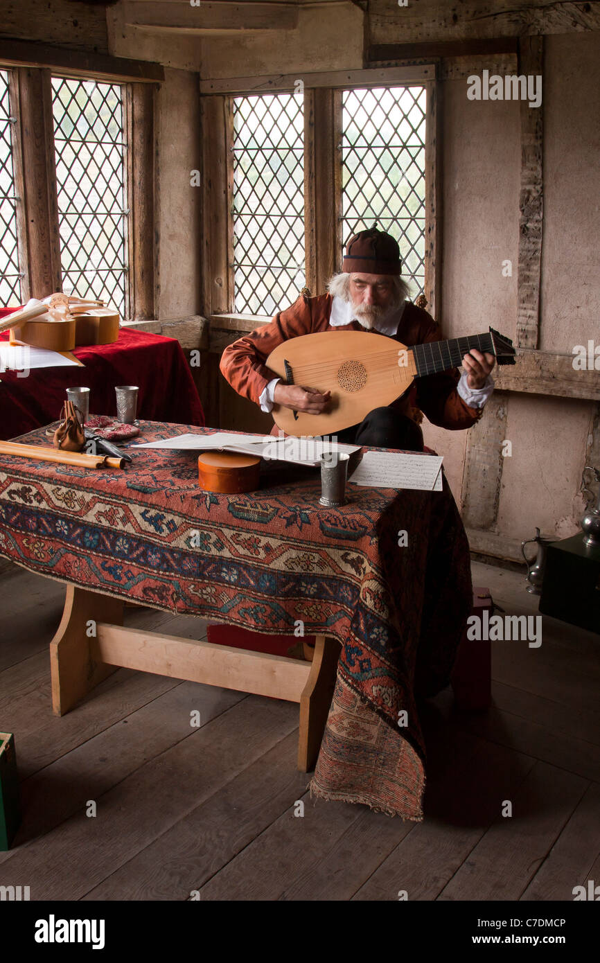Public demonstration and historical re-enactment of a musician playing ...