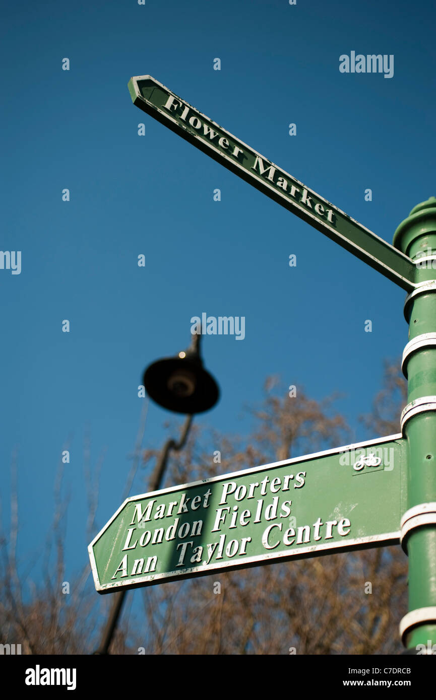 Signs at Broadway market in the East End of London pointing to Flower ...