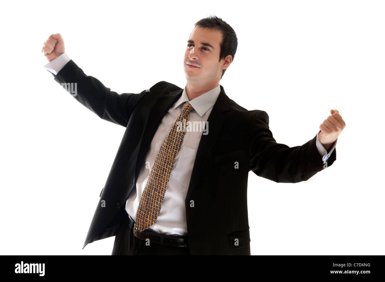 Excited businessman celebrating success dark hi-res stock photography ...