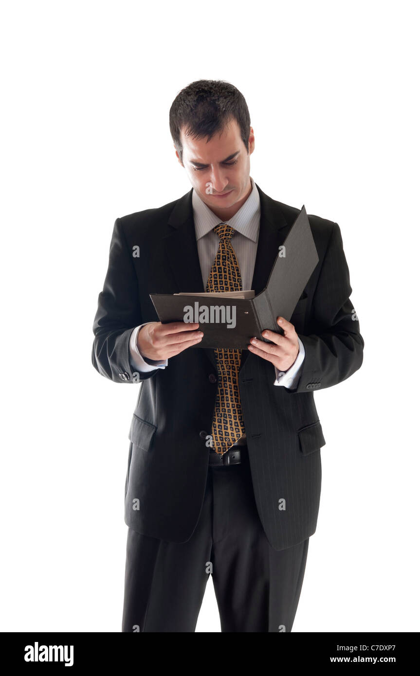 Isolated young business man reading Stock Photo - Alamy