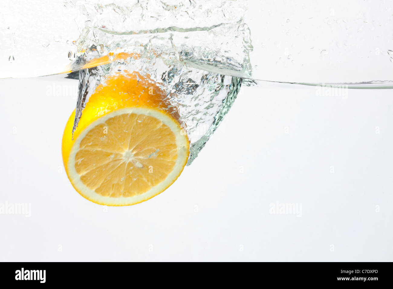 Lemon Splashing in Water Stock Photo - Alamy