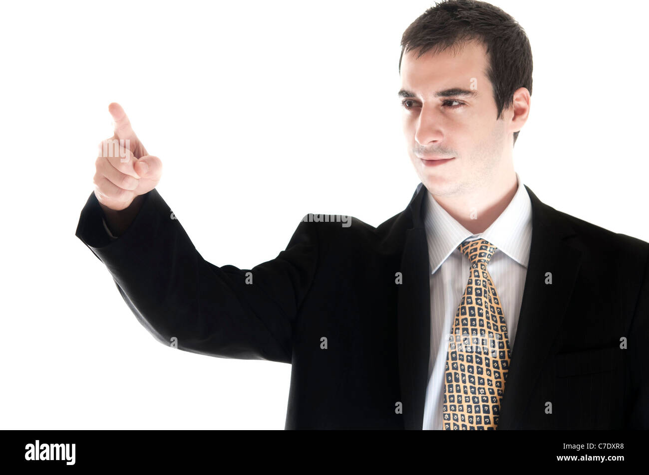 Isolated young business man pointing Stock Photo - Alamy