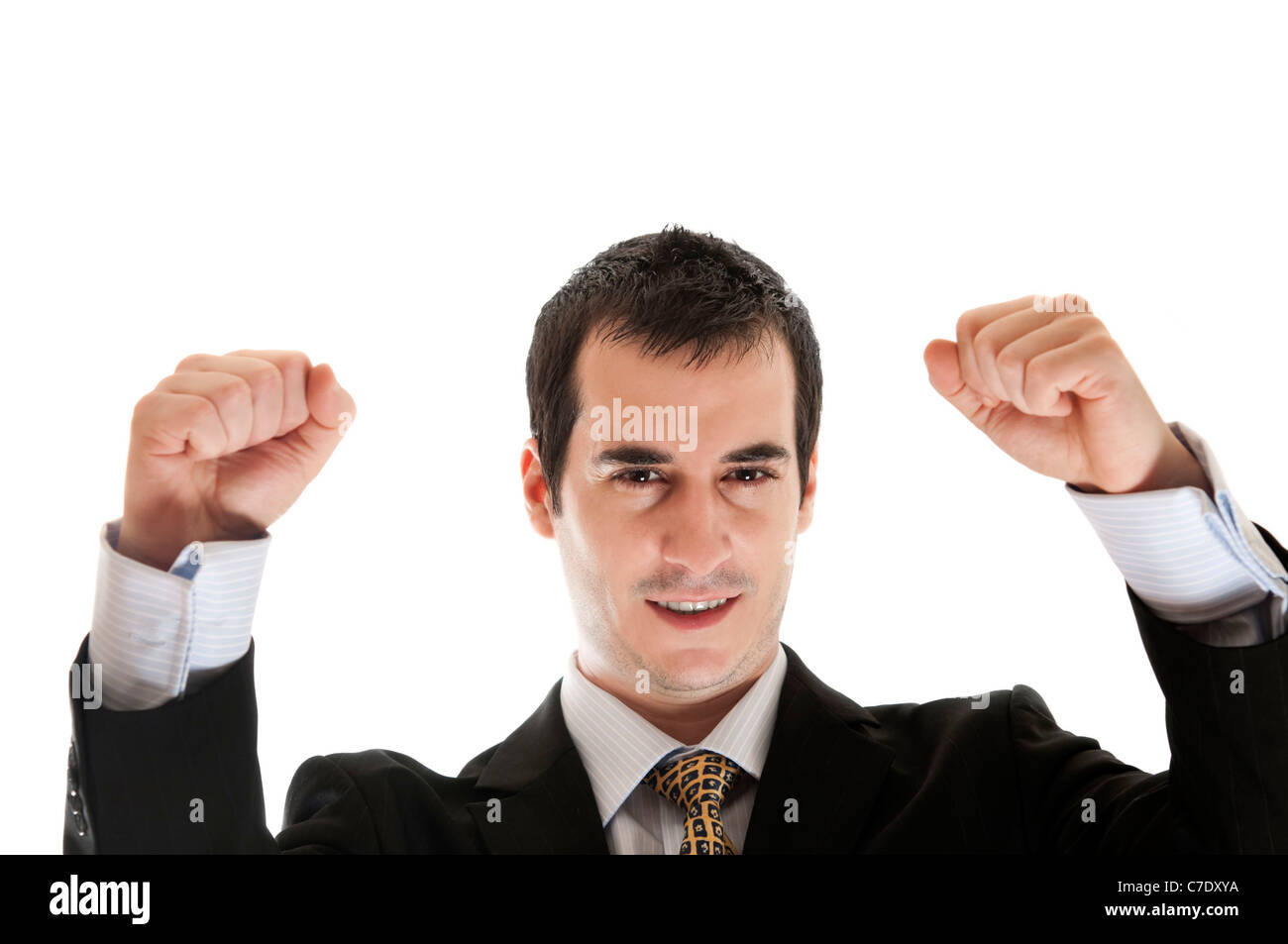 Excited businessman celebrating success dark hi-res stock photography ...