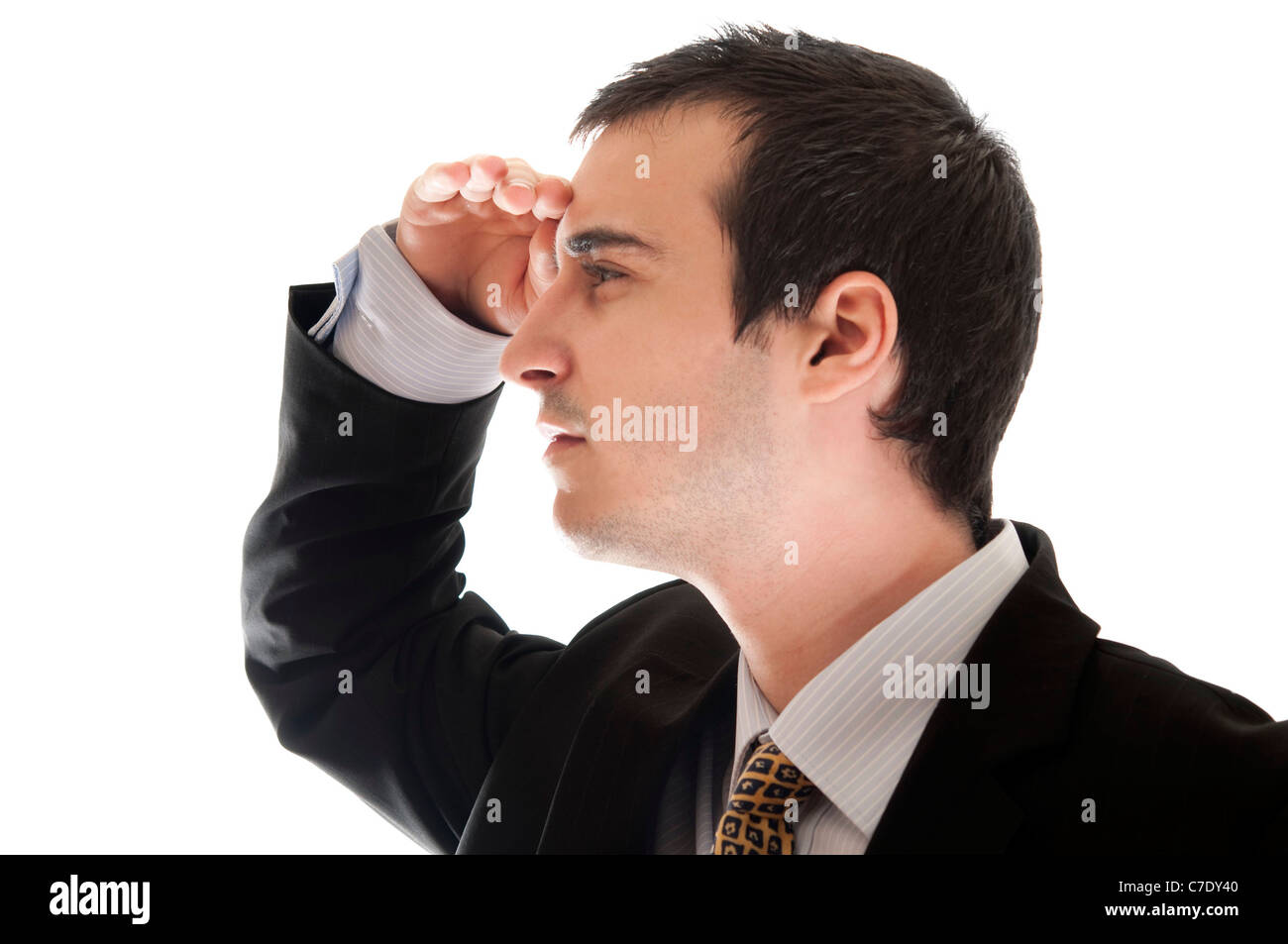 Isolated young business man watching Stock Photo - Alamy