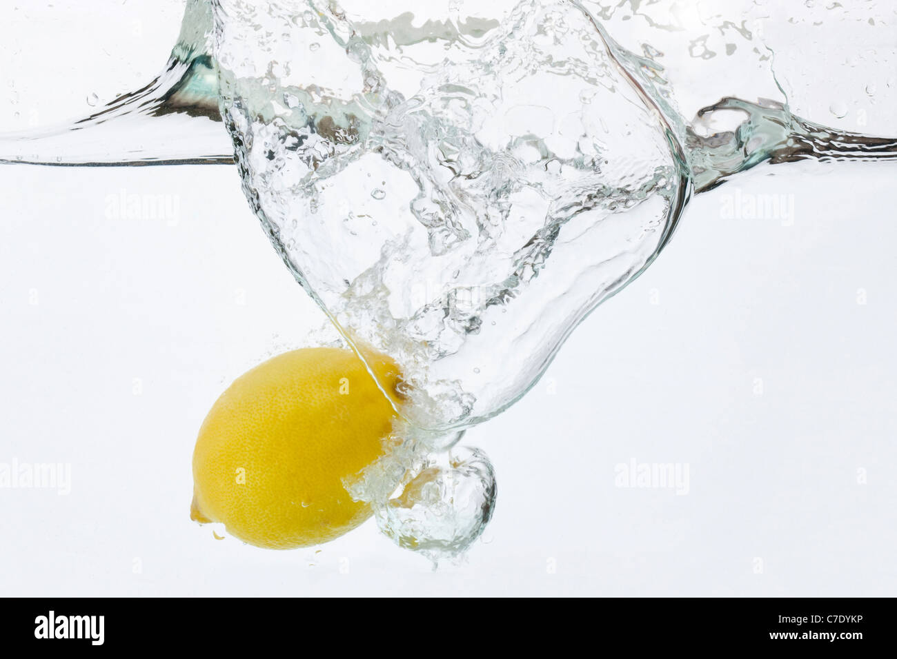 Lemon Splashing in Water Stock Photo - Alamy
