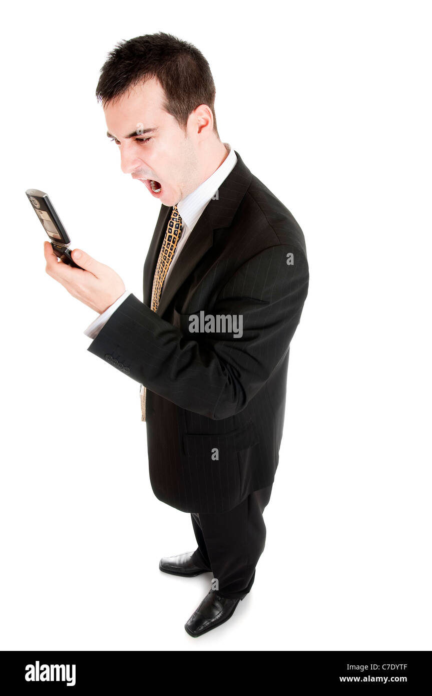 Isolated angry business man speaking on phone Stock Photo - Alamy