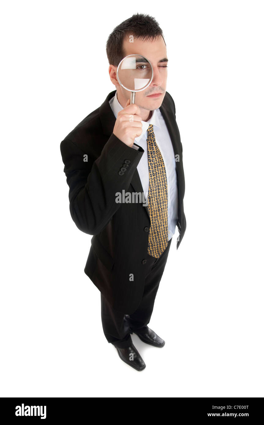 Business man with magnifying glass Stock Photo - Alamy