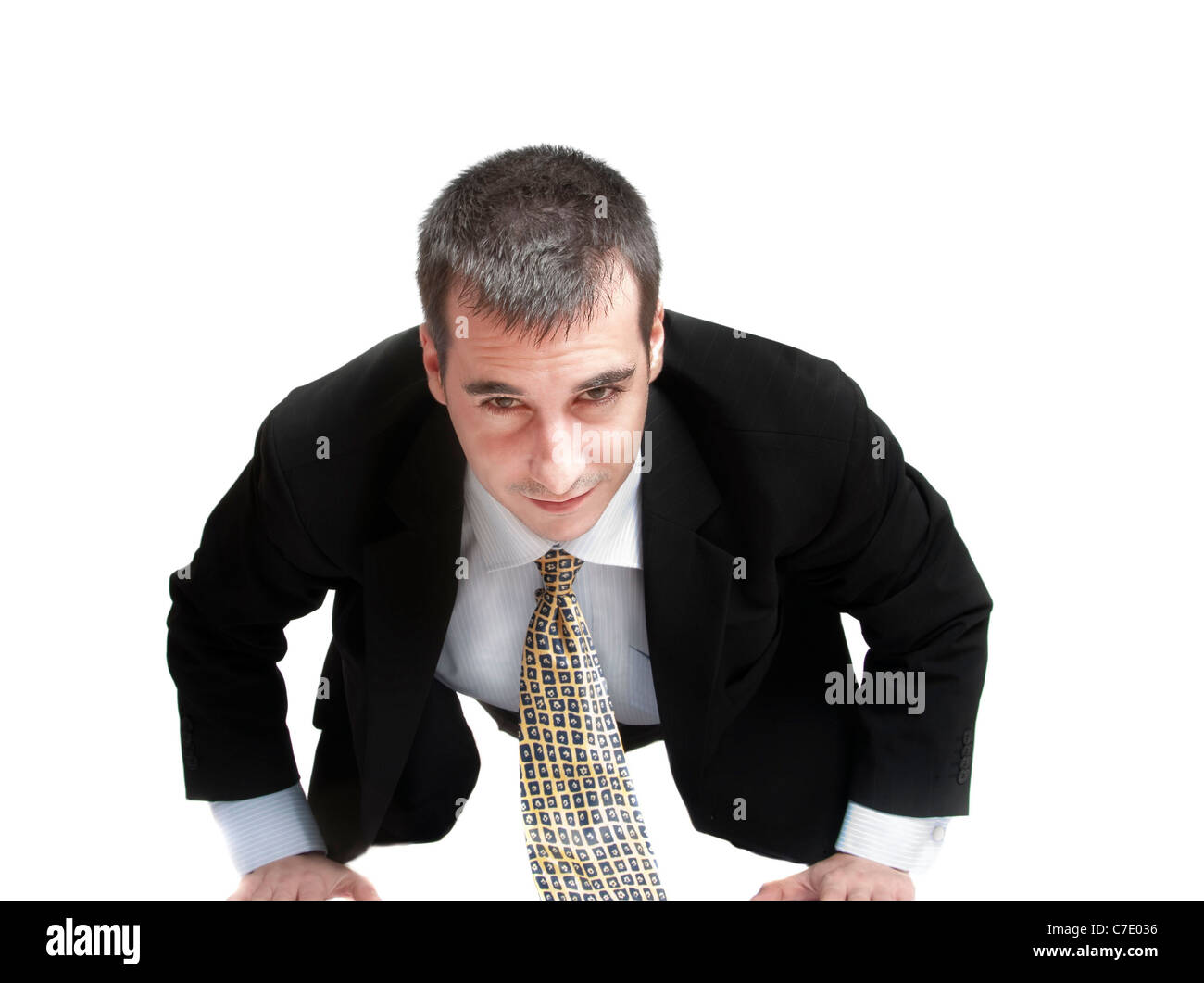 Isolated business man doing push ups Stock Photo - Alamy