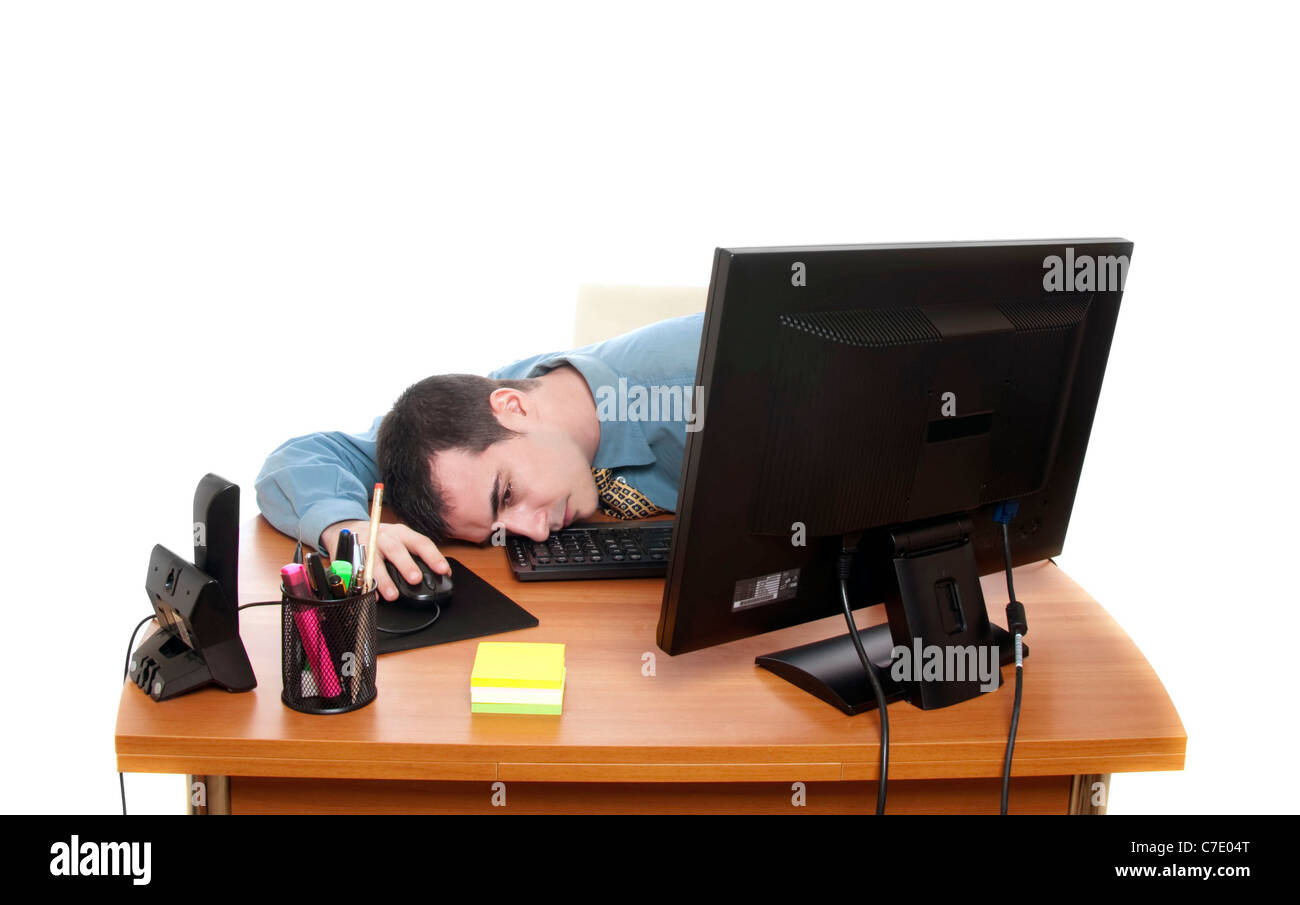 Isolated worker at office desk on white background Stock Photo - Alamy