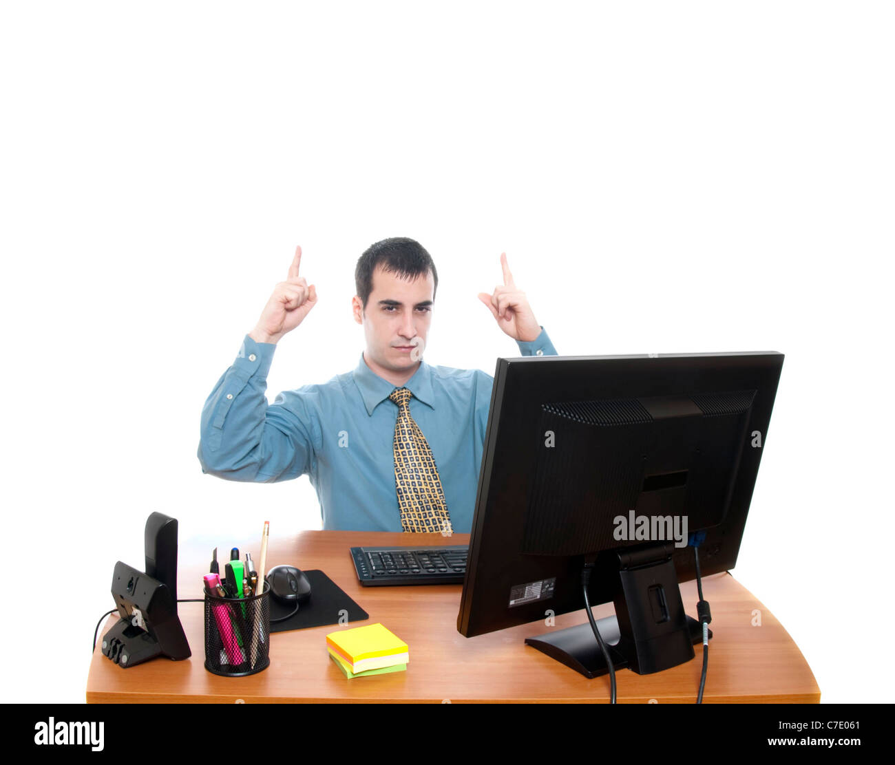 Isolated worker at office desk on white background Stock Photo - Alamy