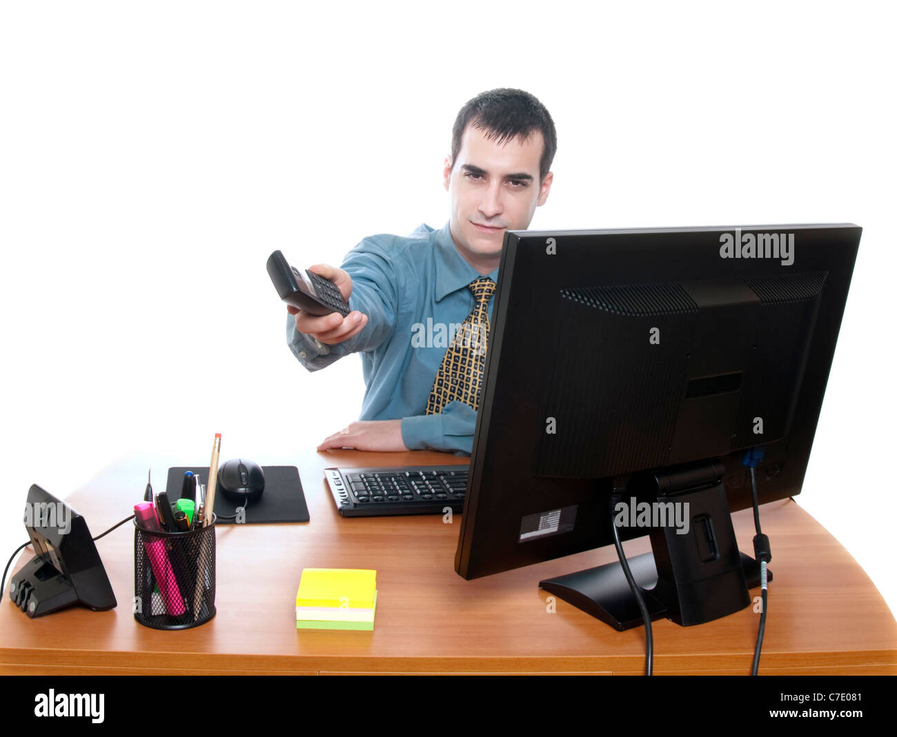 Isolated worker at office desk handing the phone Stock Photo - Alamy