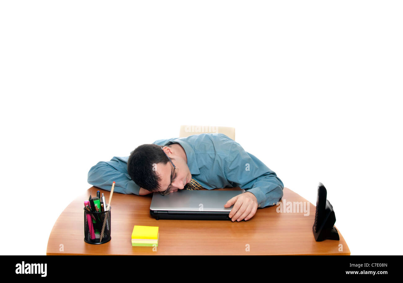 Isolated worker at office desk on white background Stock Photo - Alamy
