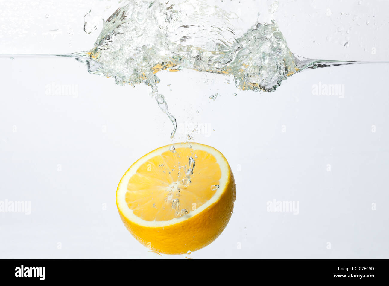 Lemon Splashing in Water Stock Photo - Alamy