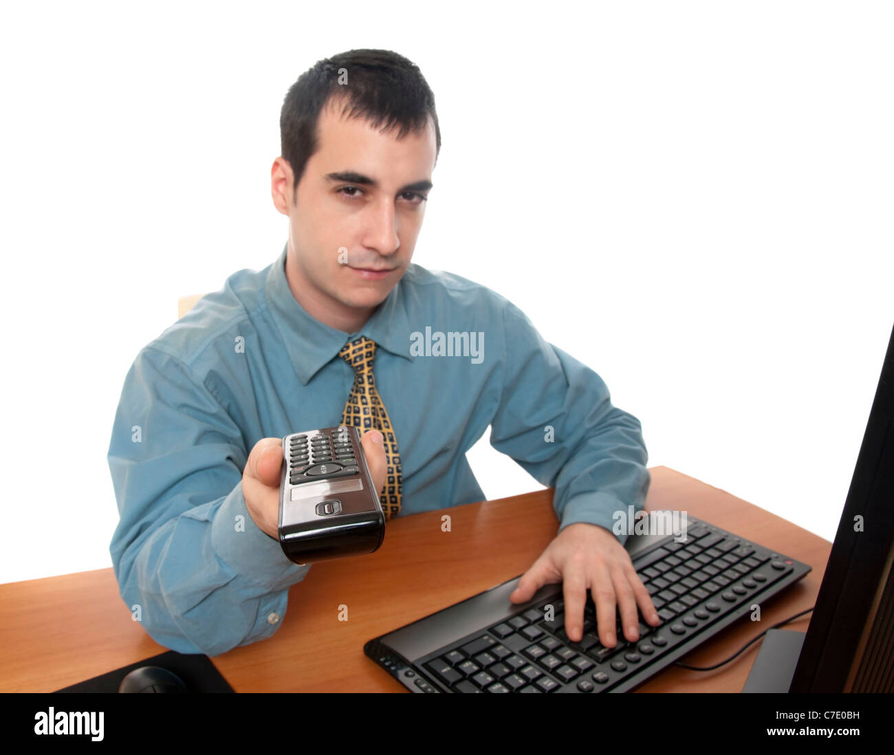 Isolated worker at office desk on white background Stock Photo - Alamy