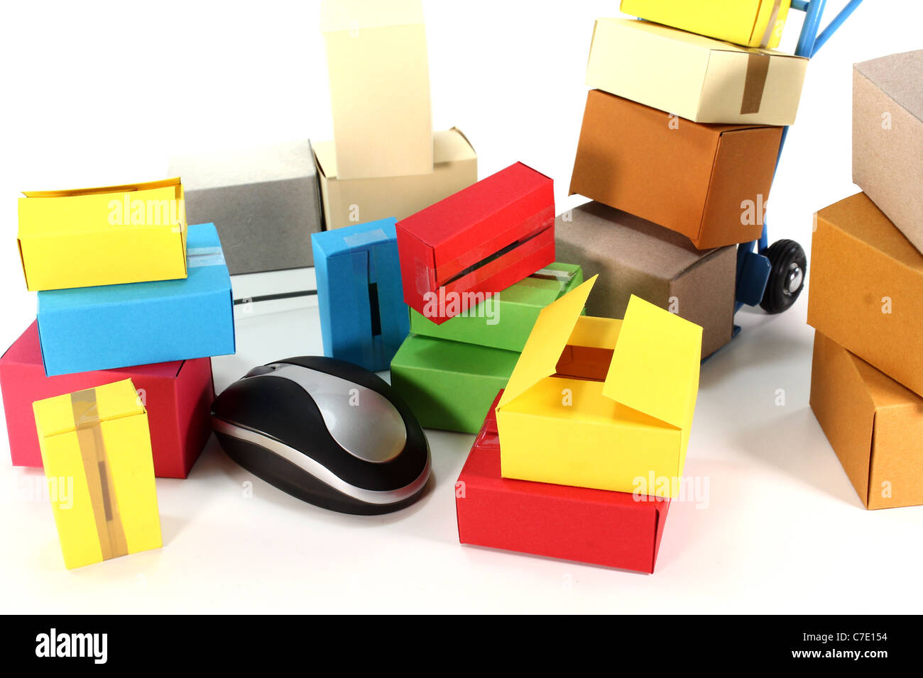 colorful packages with sack barrow and computer mouse on a white ...