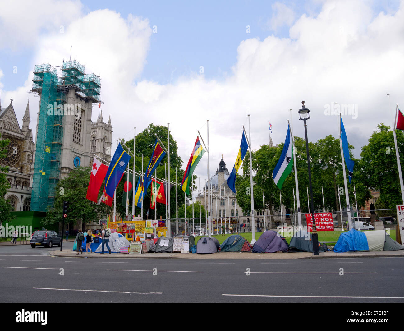 Flags by Houses of Parliament in London, the Capital City of England ...