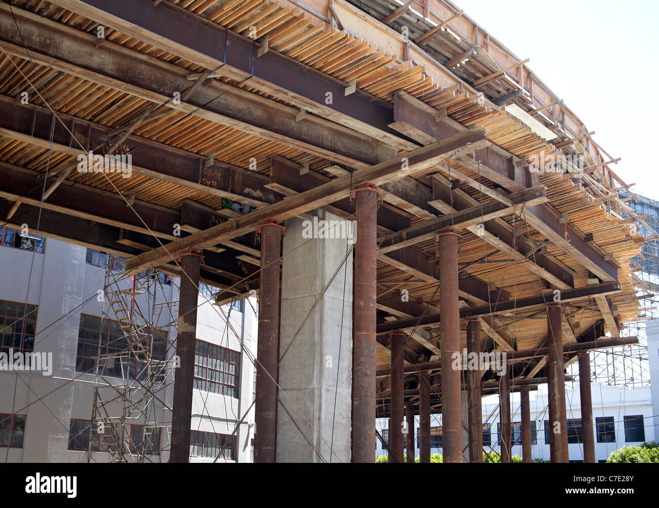 Freeway construction using concrete, steel beams, and wood Stock Photo ...