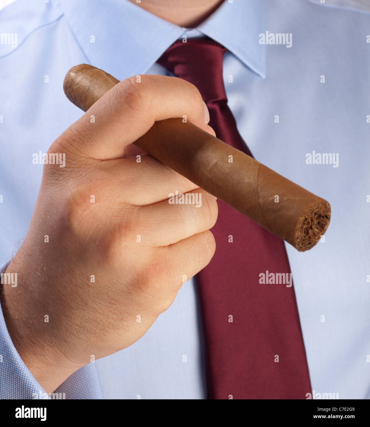 Man with a cigar in his hand hi-res stock photography and images - Alamy