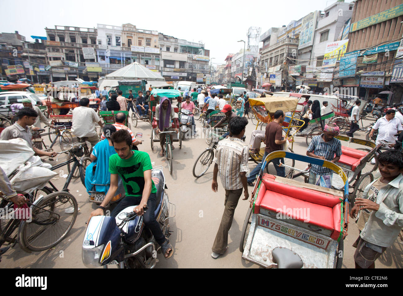 A chaotic scene of traffic in a market square in Old Delhi, India Stock ...