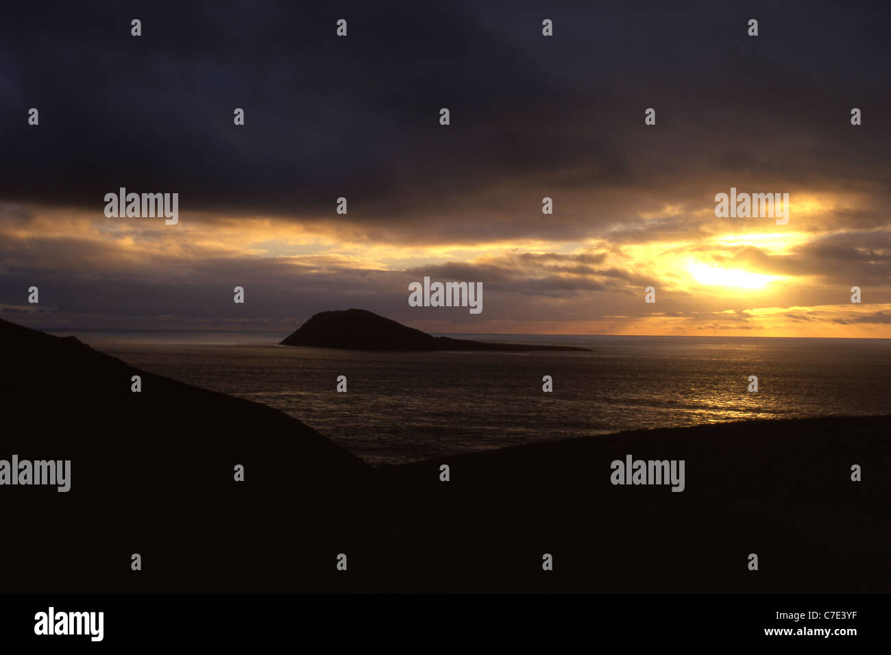 Bardsey Island (Ynys Enlli) winter sunset from near Braich y Pwll Near ...