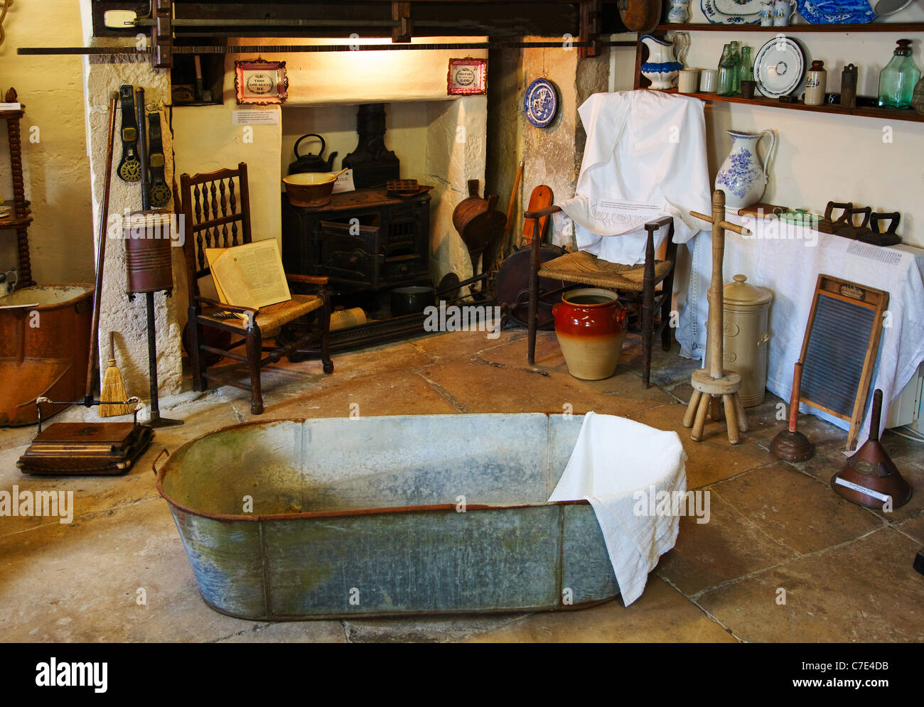 Replica of an early 20th century kitchen with iron range and a variety ...